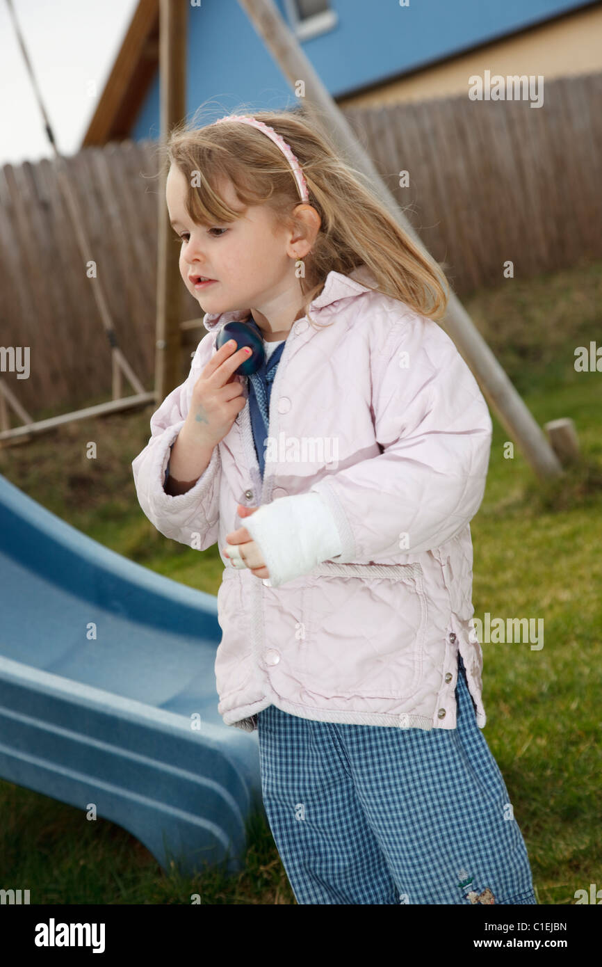 girl standing at slide Stock Photo - Alamy