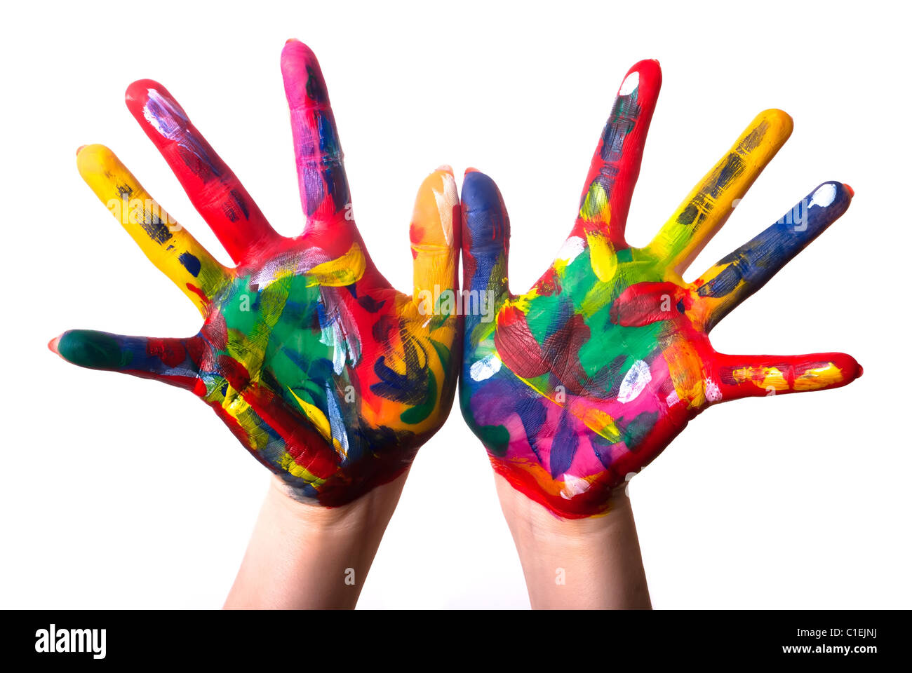 two painted colorful hands against white background Stock Photo - Alamy
