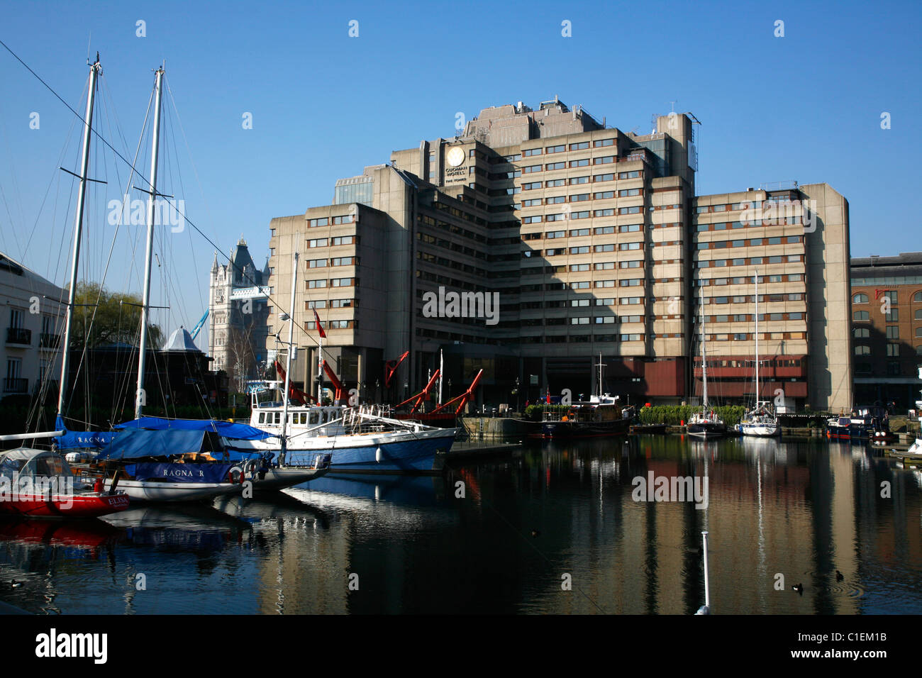 View across St Katharine's Dock to Tower Hotel and Tower Bridge ...