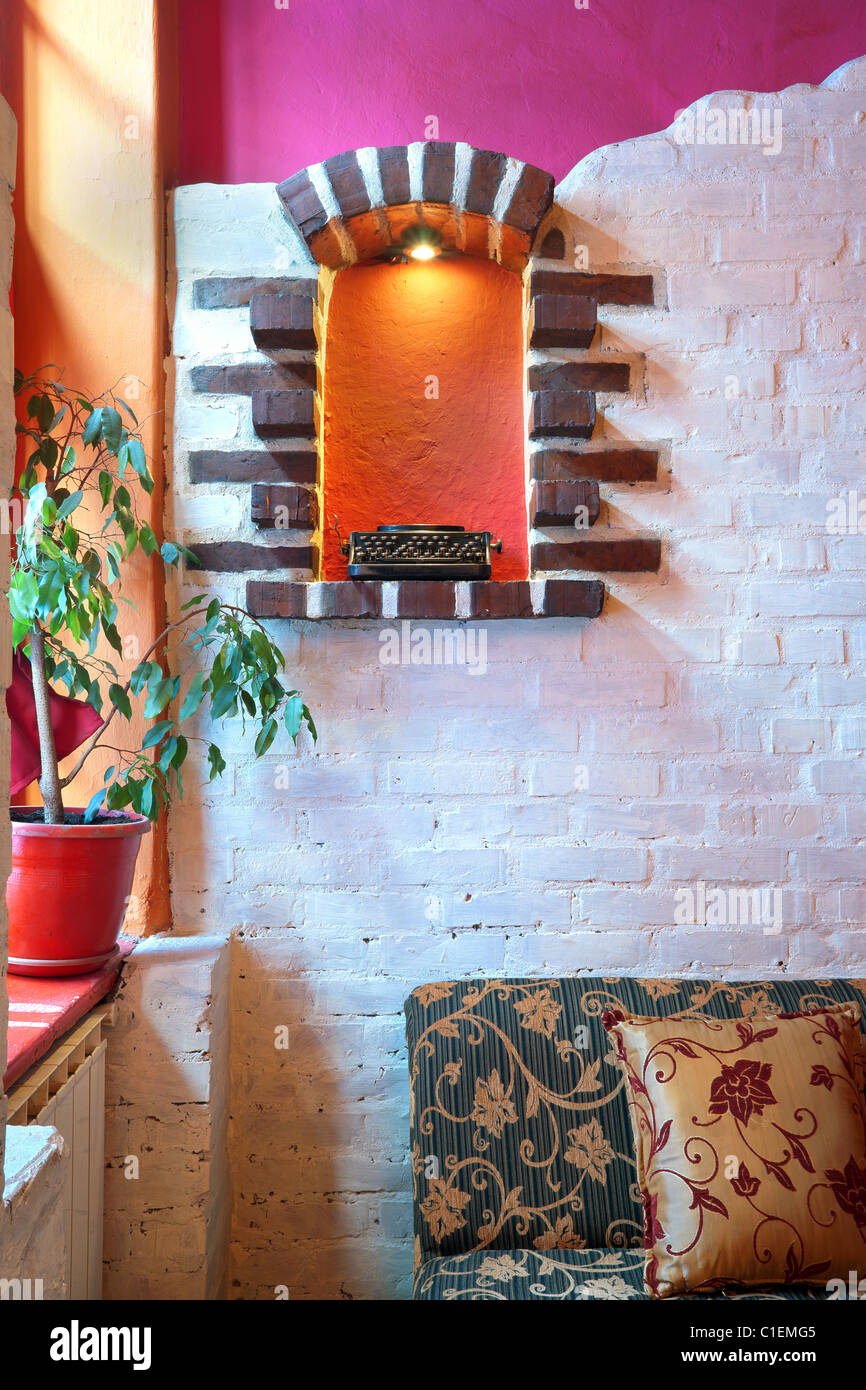 Wall decoration in a cafe with furniture, beside the window Stock Photo ...