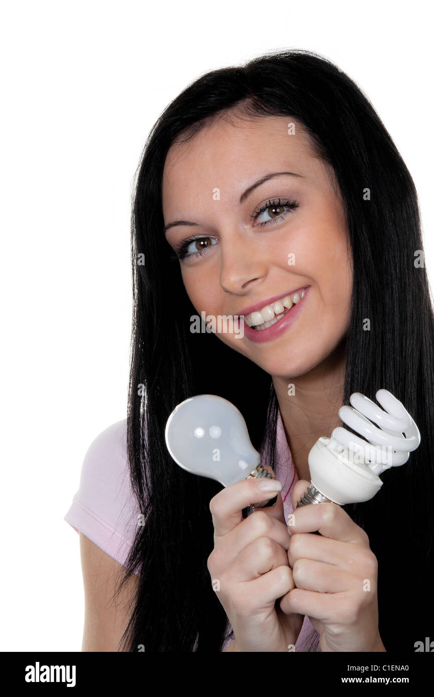 Women with energy-saving lamp. Energy lamp and bulb Stock Photo - Alamy