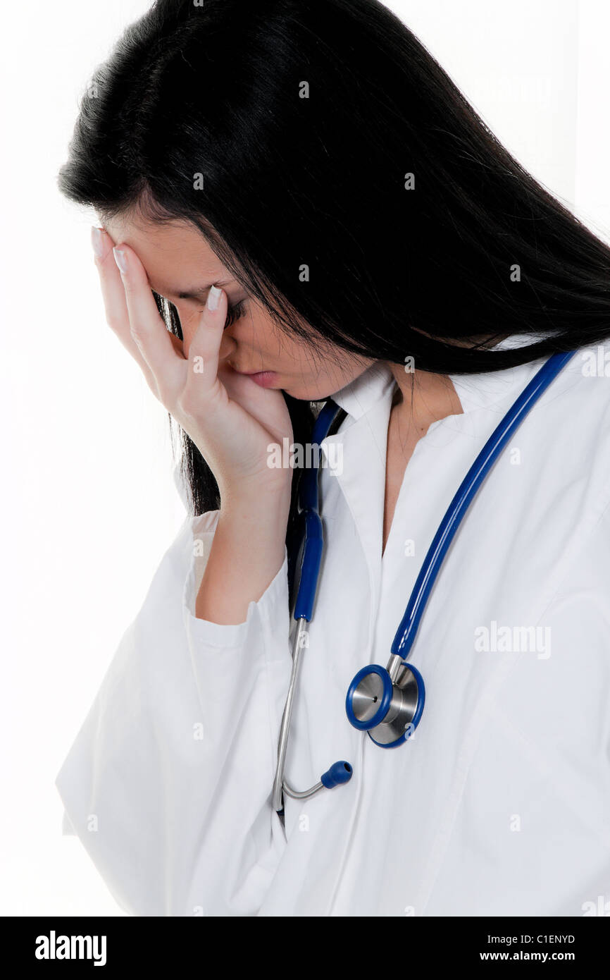 Overburdened doctor at the hospital under stress Stock Photo - Alamy