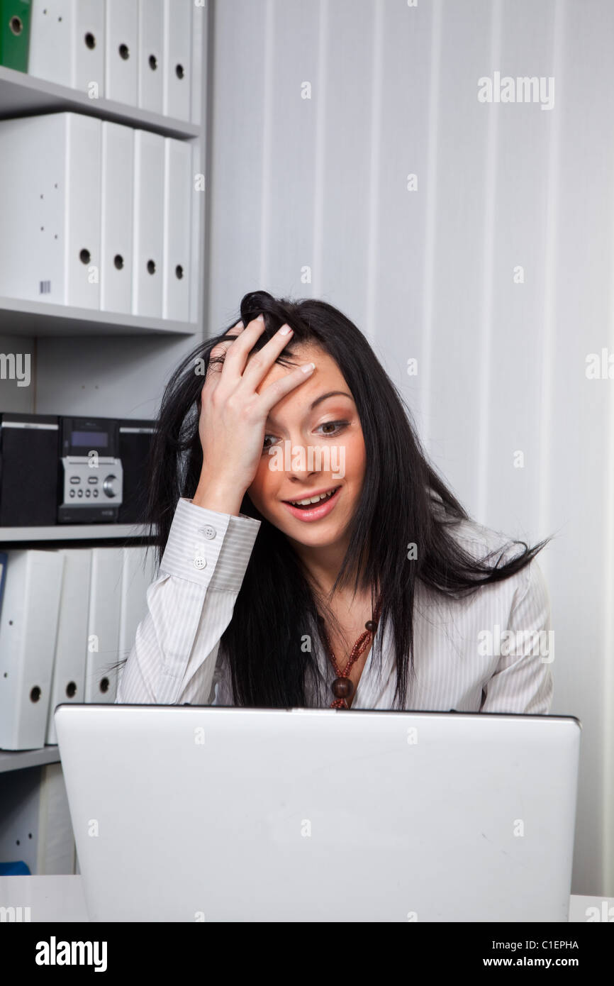 Desperate young woman facing problem hi-res stock photography and ...