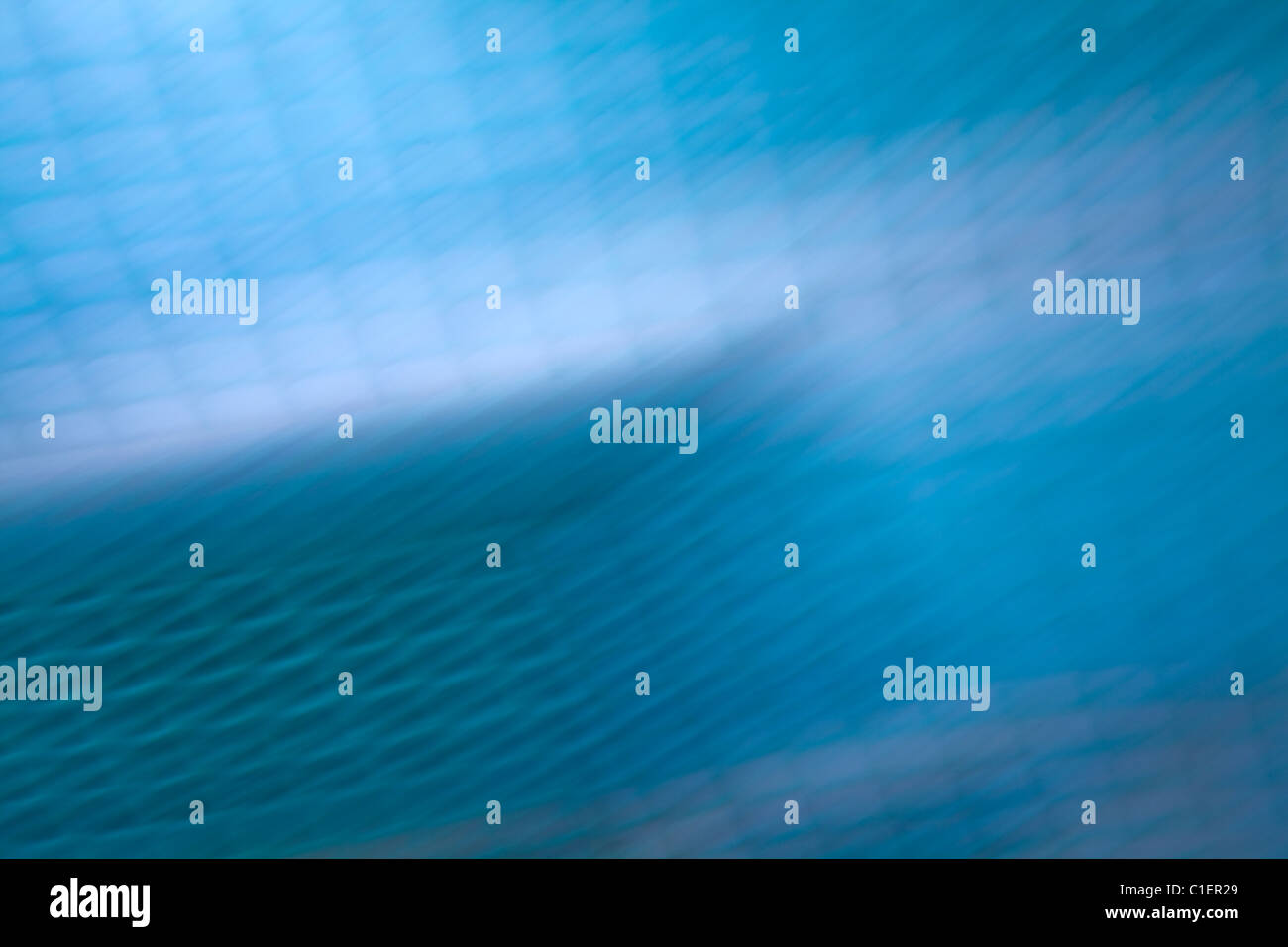 Blue background. Iridescence of light on a shiny surface Stock Photo ...