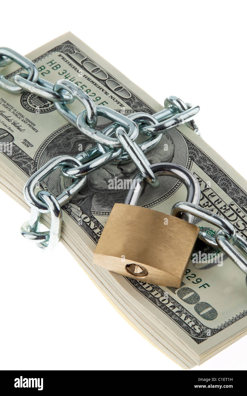 U.S. dollars banknotes with lock and chain. Stacks of money for safety ...