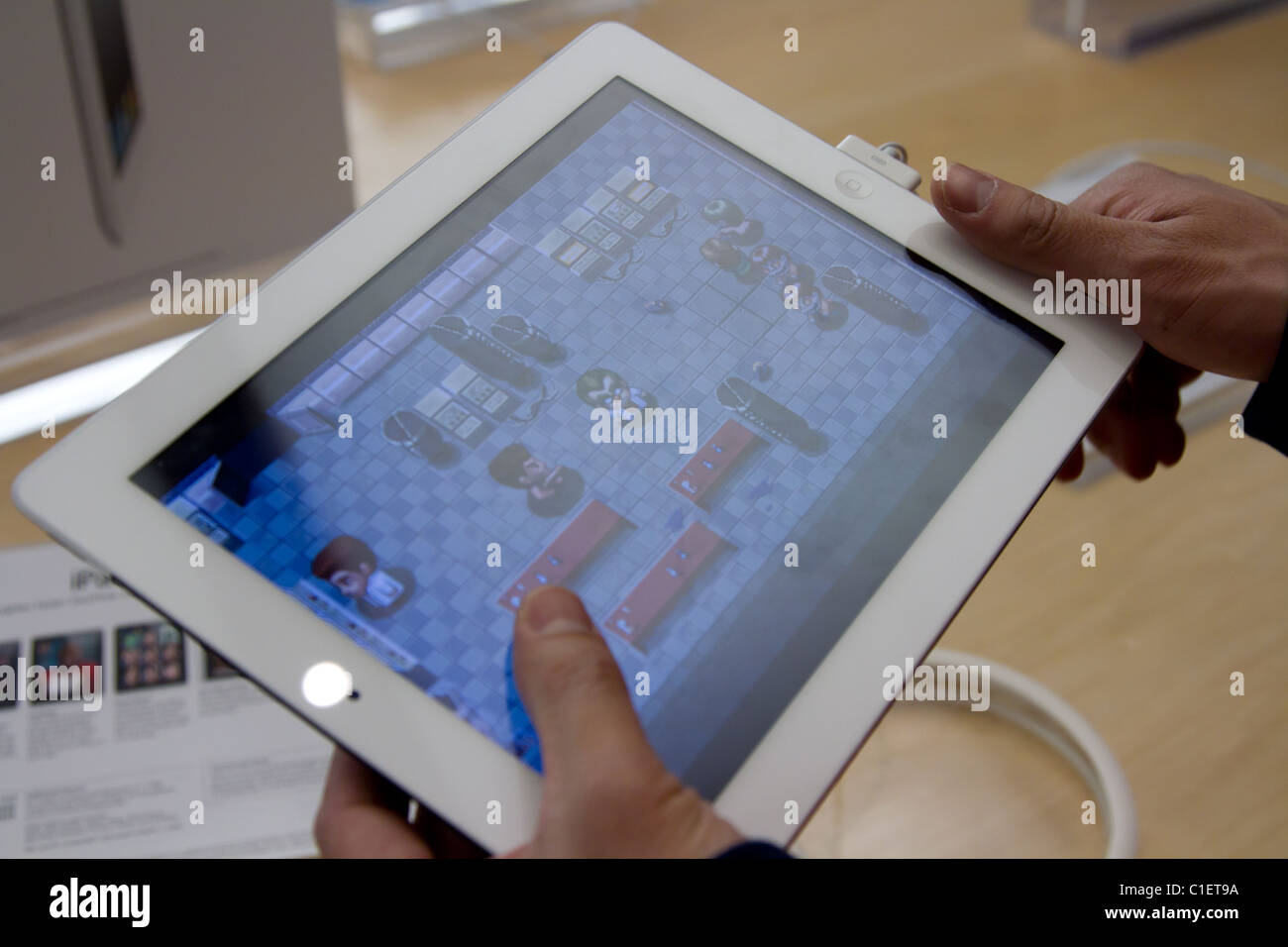 ipad playing games Stock Photo - Alamy