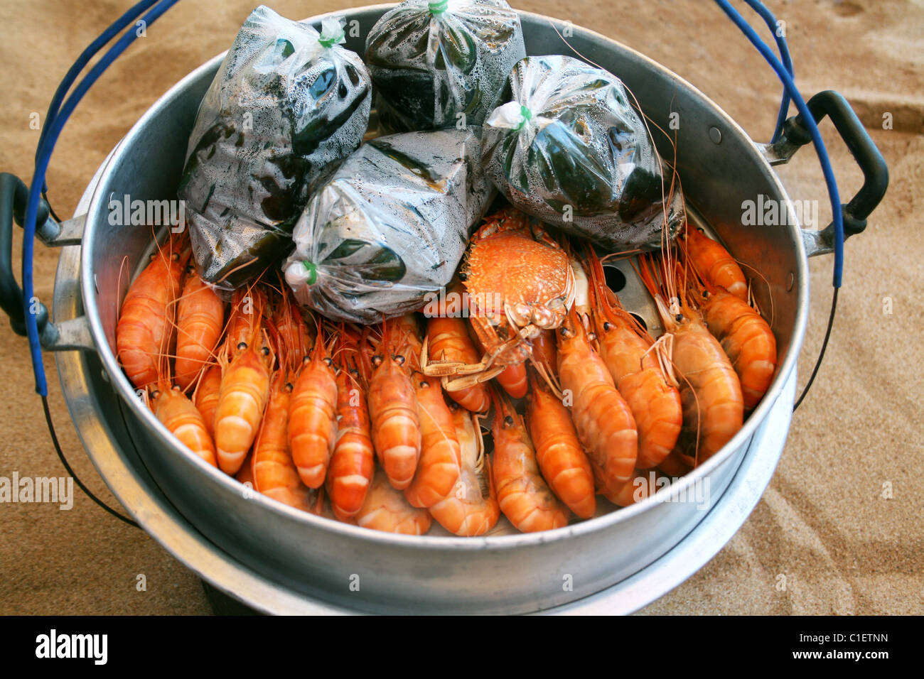 Royal prawns in aluminum saucepan on song Stock Photo - Alamy