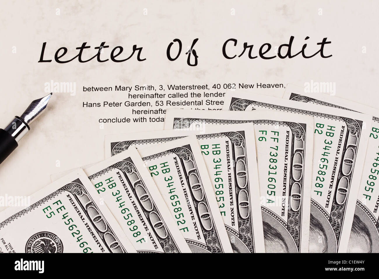 Many dollar bills and English credit Stock Photo - Alamy