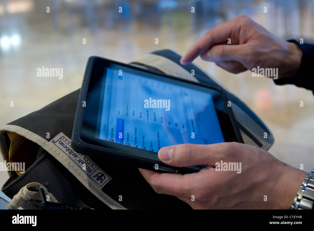 man using apple ipad tablet Stock Photo - Alamy