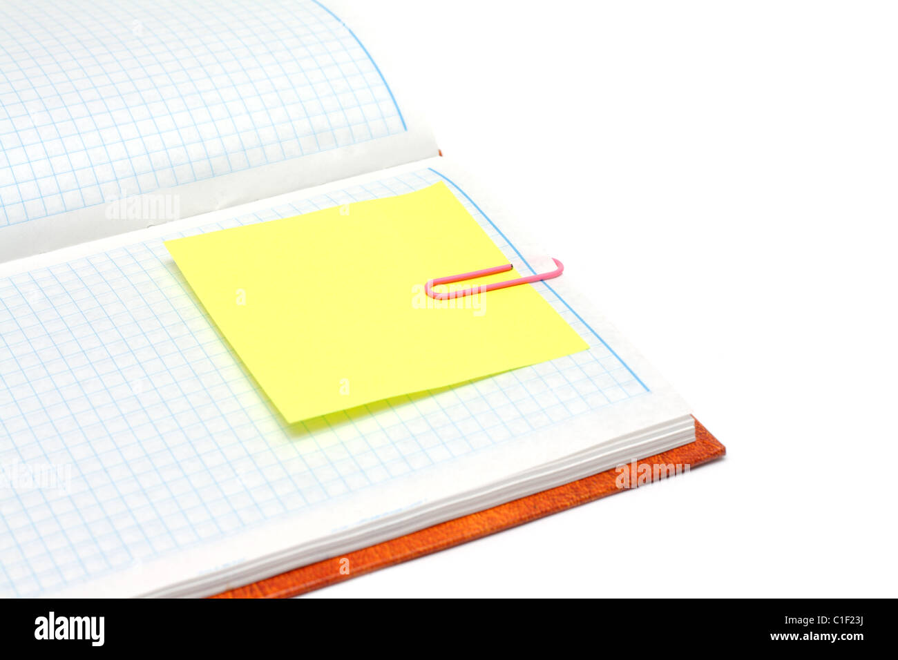 Note pad with plaid paper, yellow bookmark and rose staple Stock Photo ...