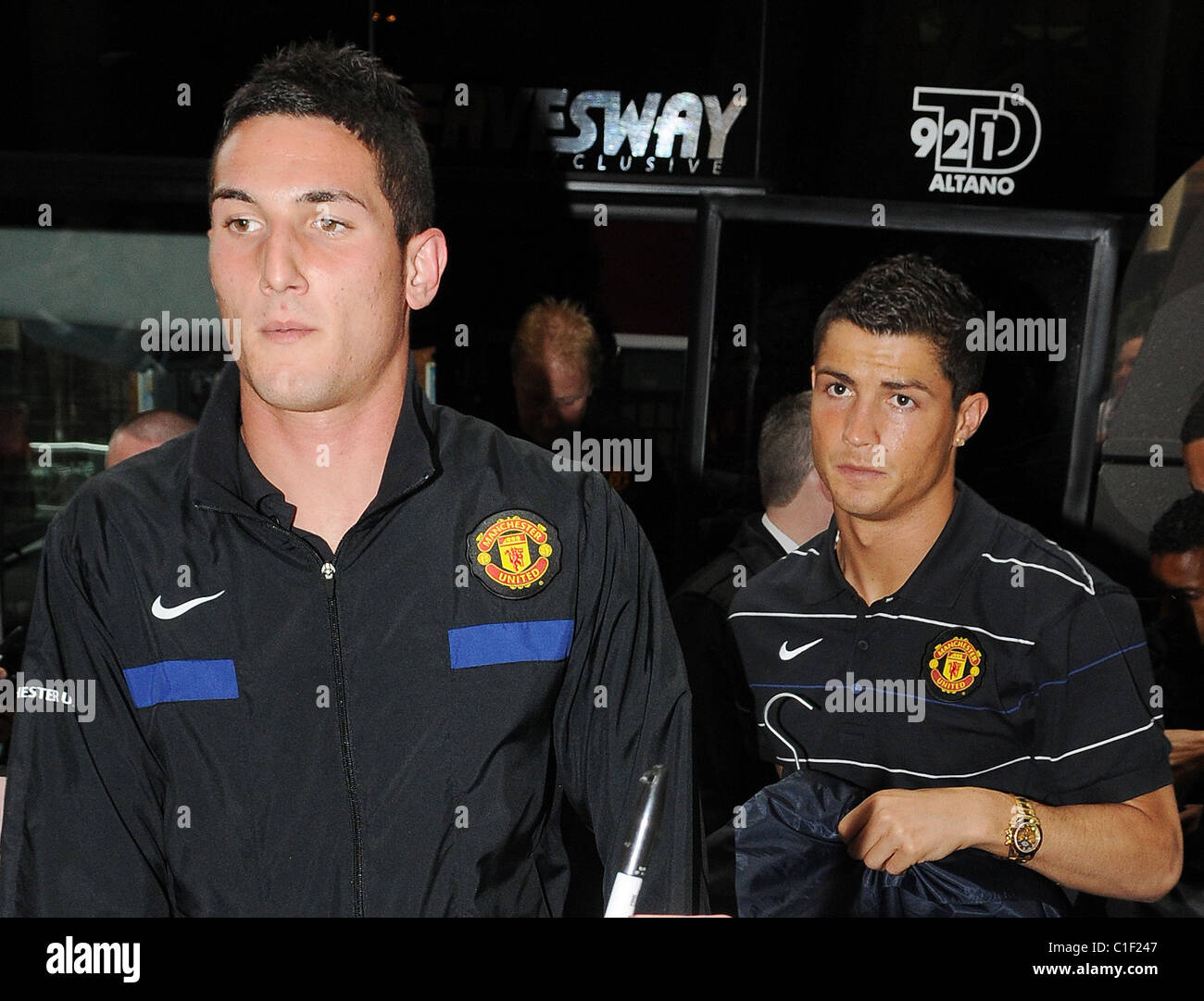 Federico Macheda and Christiano Ronaldo of Manchester Utd arriving at ...
