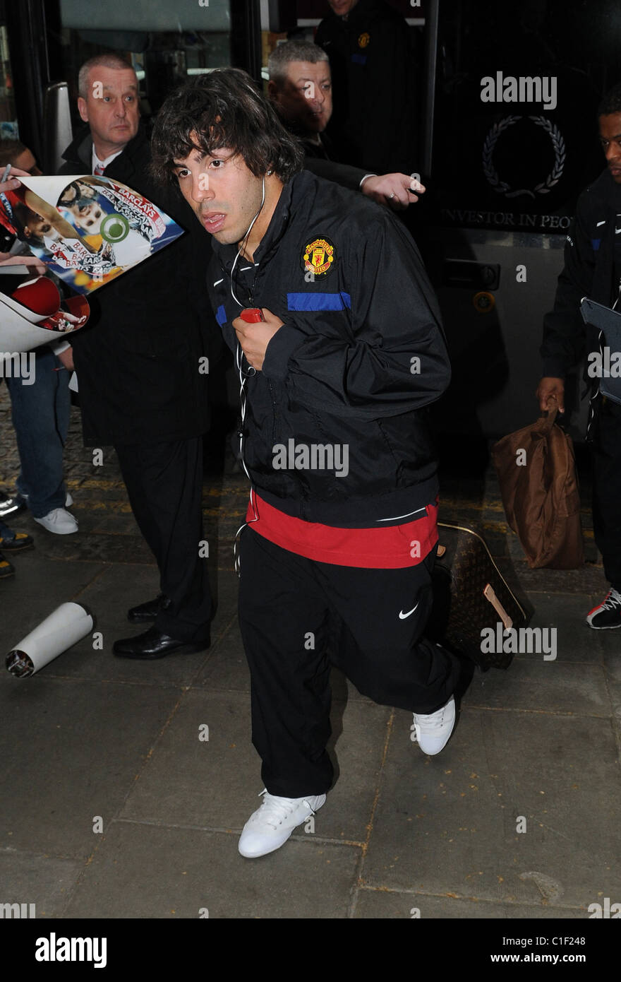 Carlos Tevez of Manchester Utd arriving at the team's hotel ahead of ...