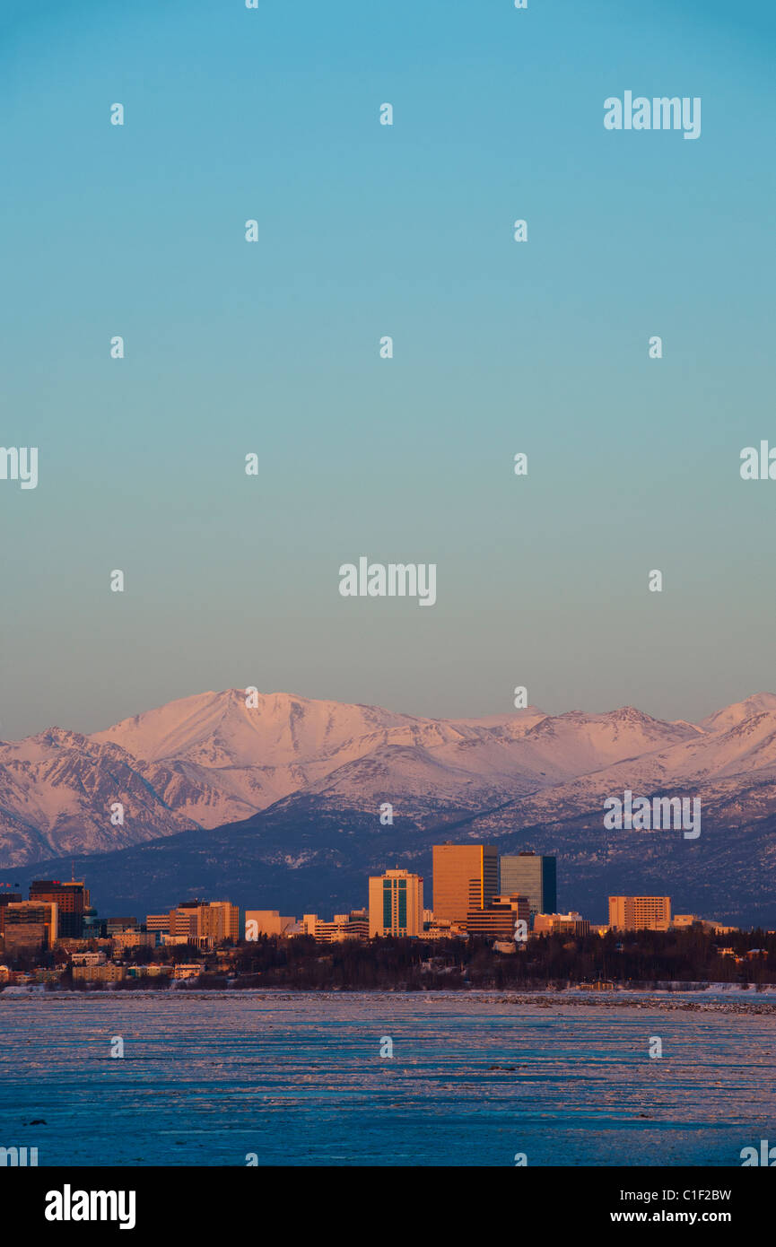 THE CHUGACH MOUNTAINS STAND BEHIND THE ANCHORAGE SKYLINE AT DUSK Stock ... THE CHUGACH MOUNTAINS STAND BEHIND THE ANCHORAGE SKYLINE AT DUSK Stock ...