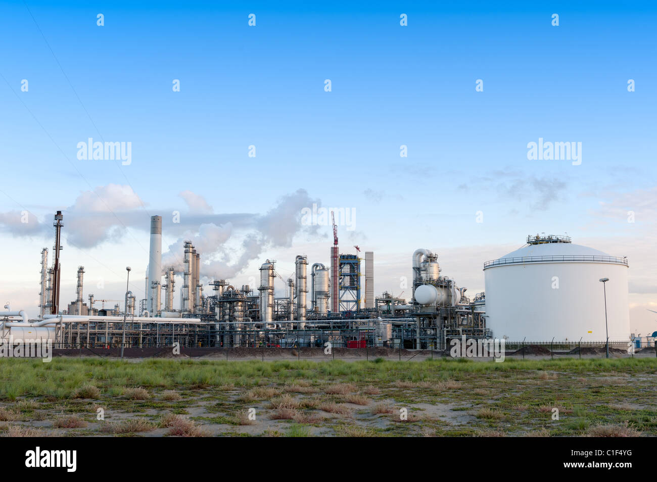 Oil refinery at the Maasvlakte in Holland Stock Photo - Alamy