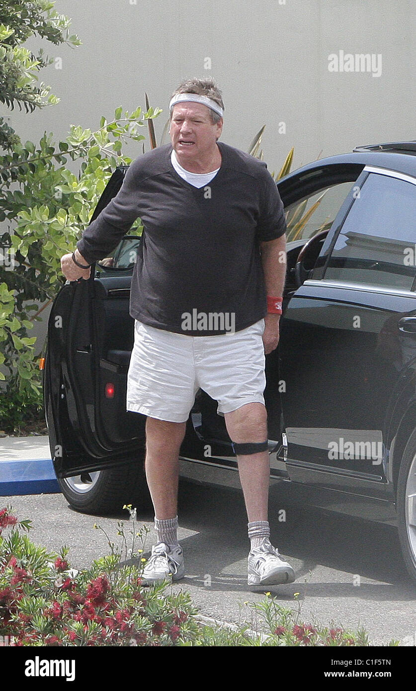 Ryan O'Neal wearing a support bandage on his left leg arrives in good ...