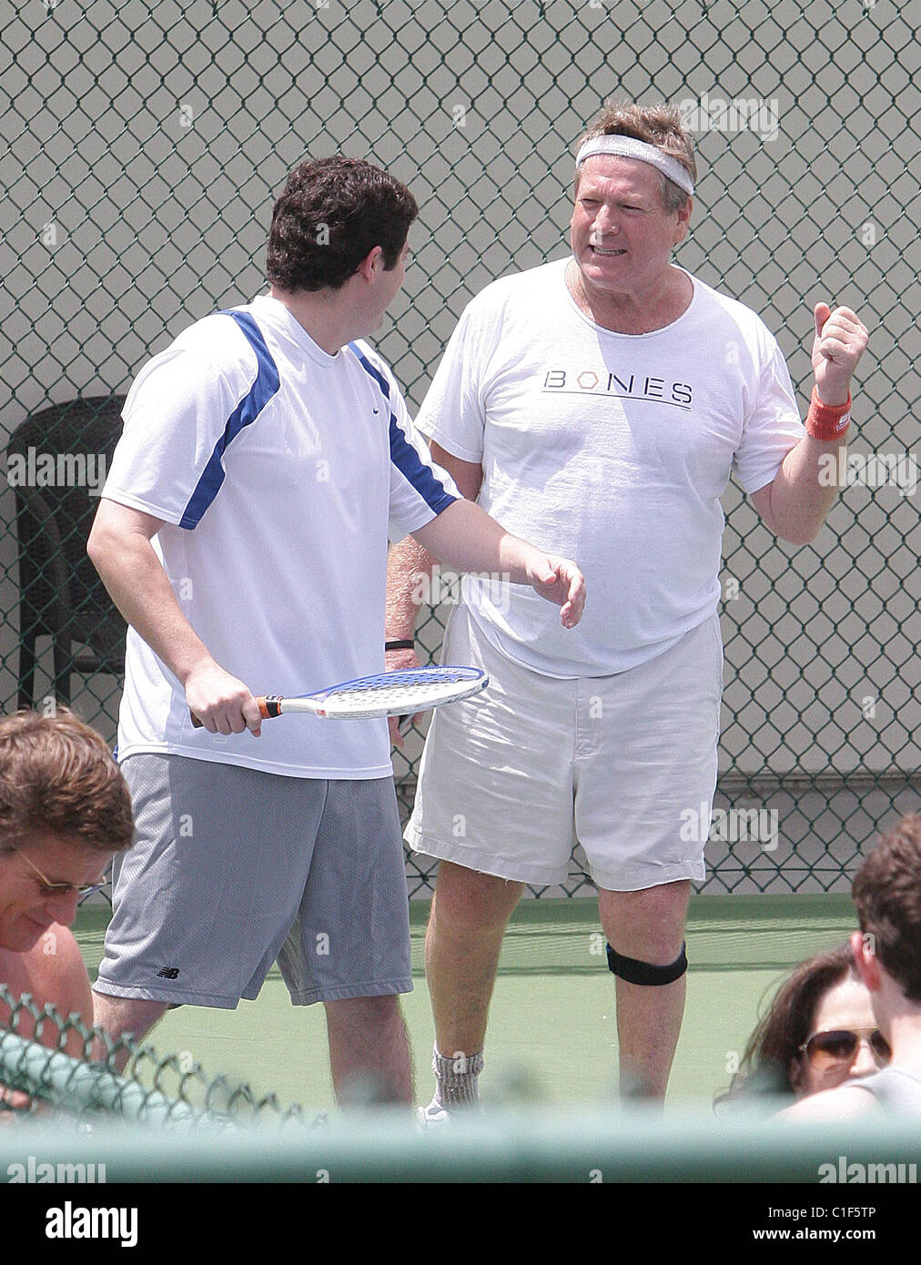 Ryan O'Neal wearing a support bandage on his left leg arrives in good ...
