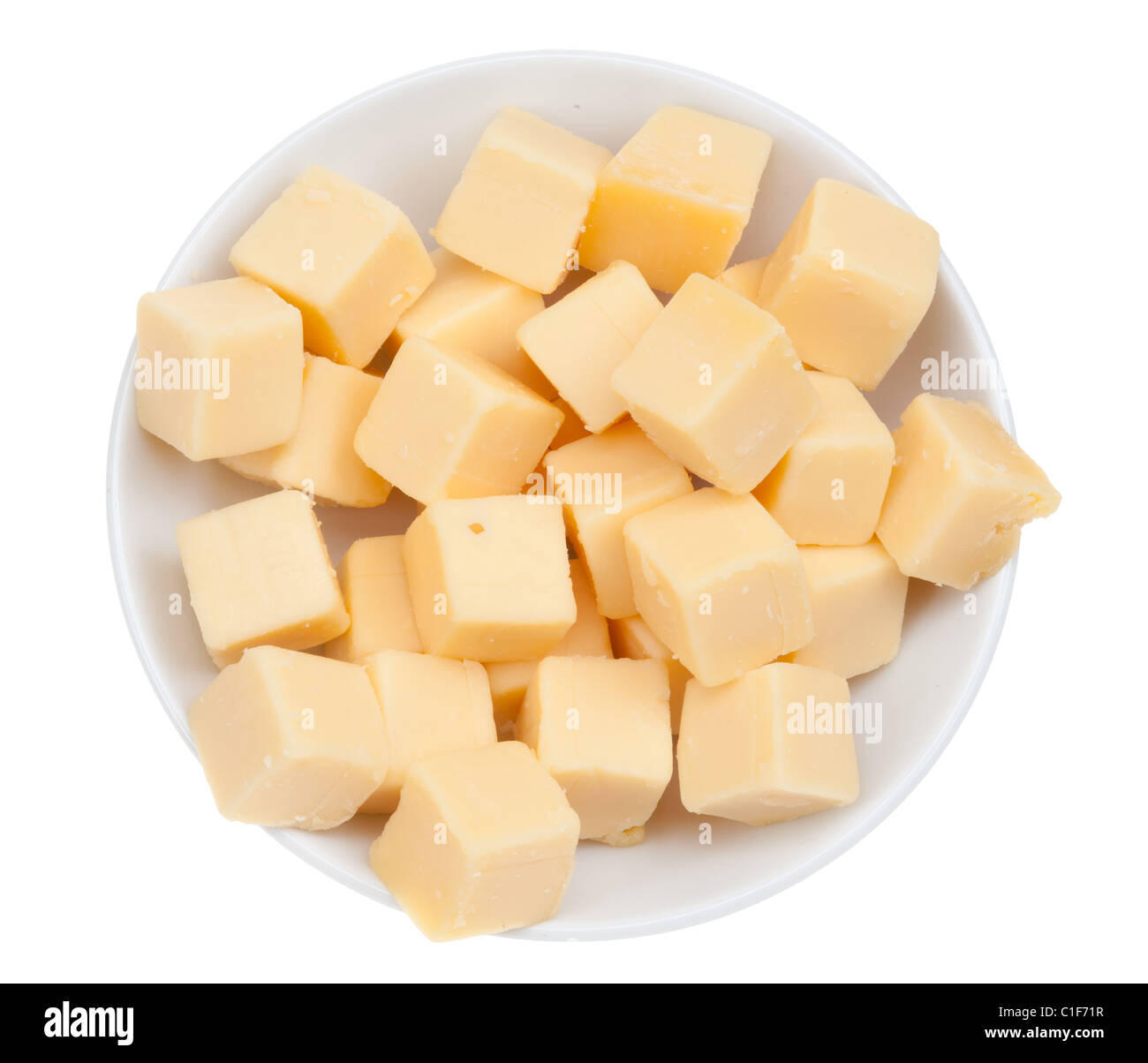 blocks of cheese in a bowl isolated on a white background Stock Photo ...