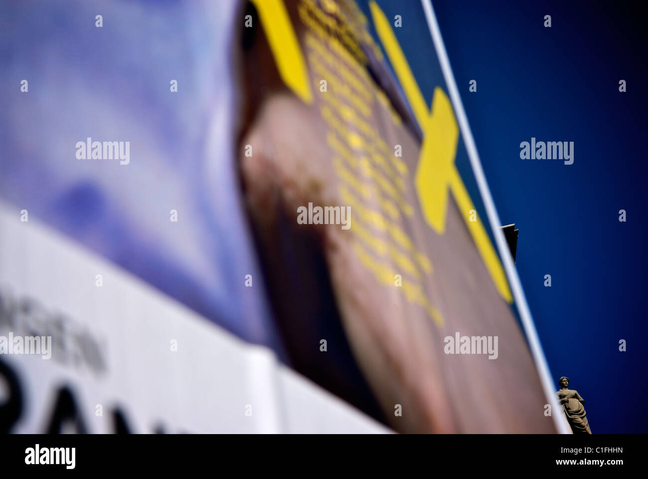 SCULPTURE BEHIND POSTER Stock Photo - Alamy