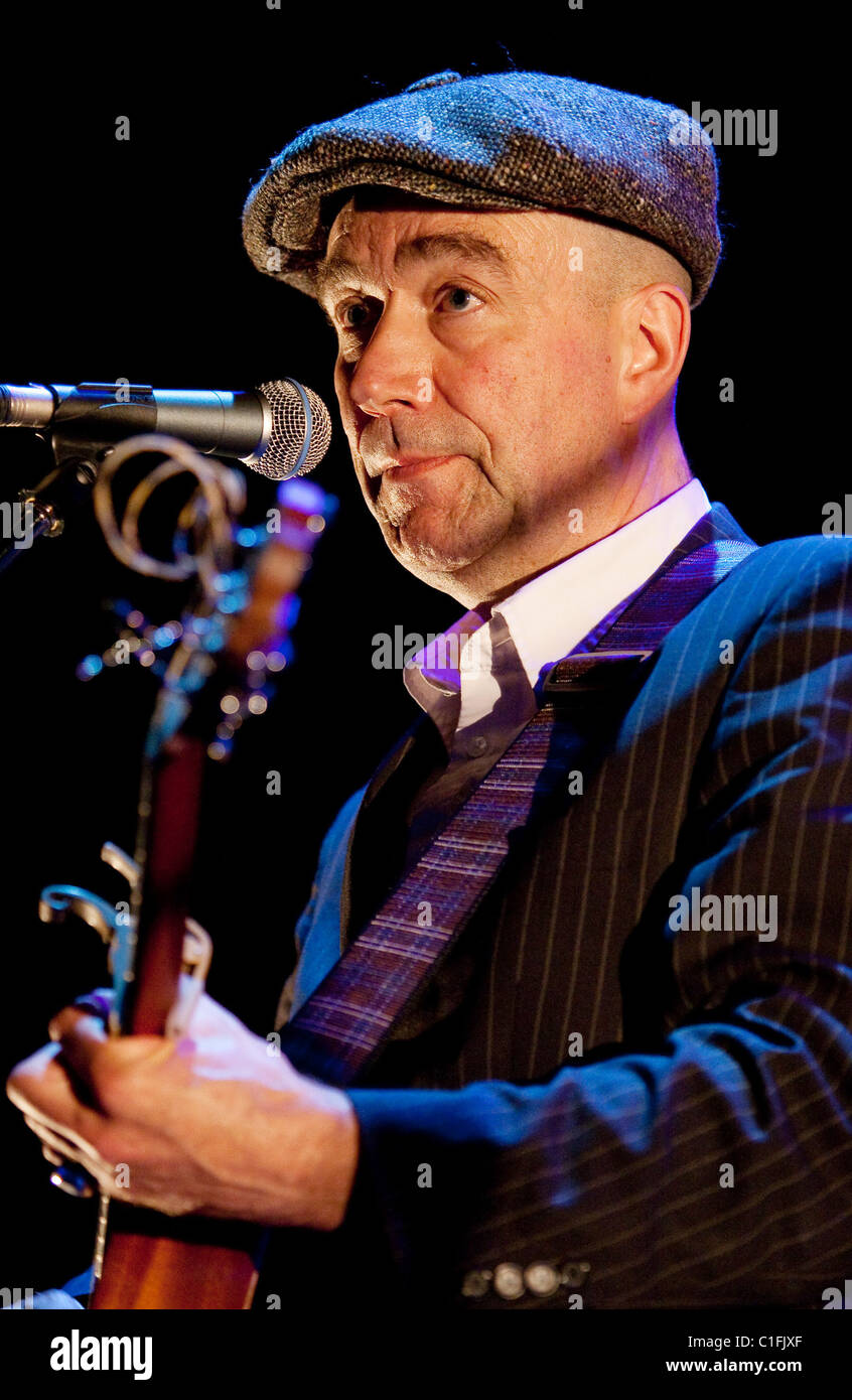 John Watts lead singer of band Fischer-Z performing live on stage at ...