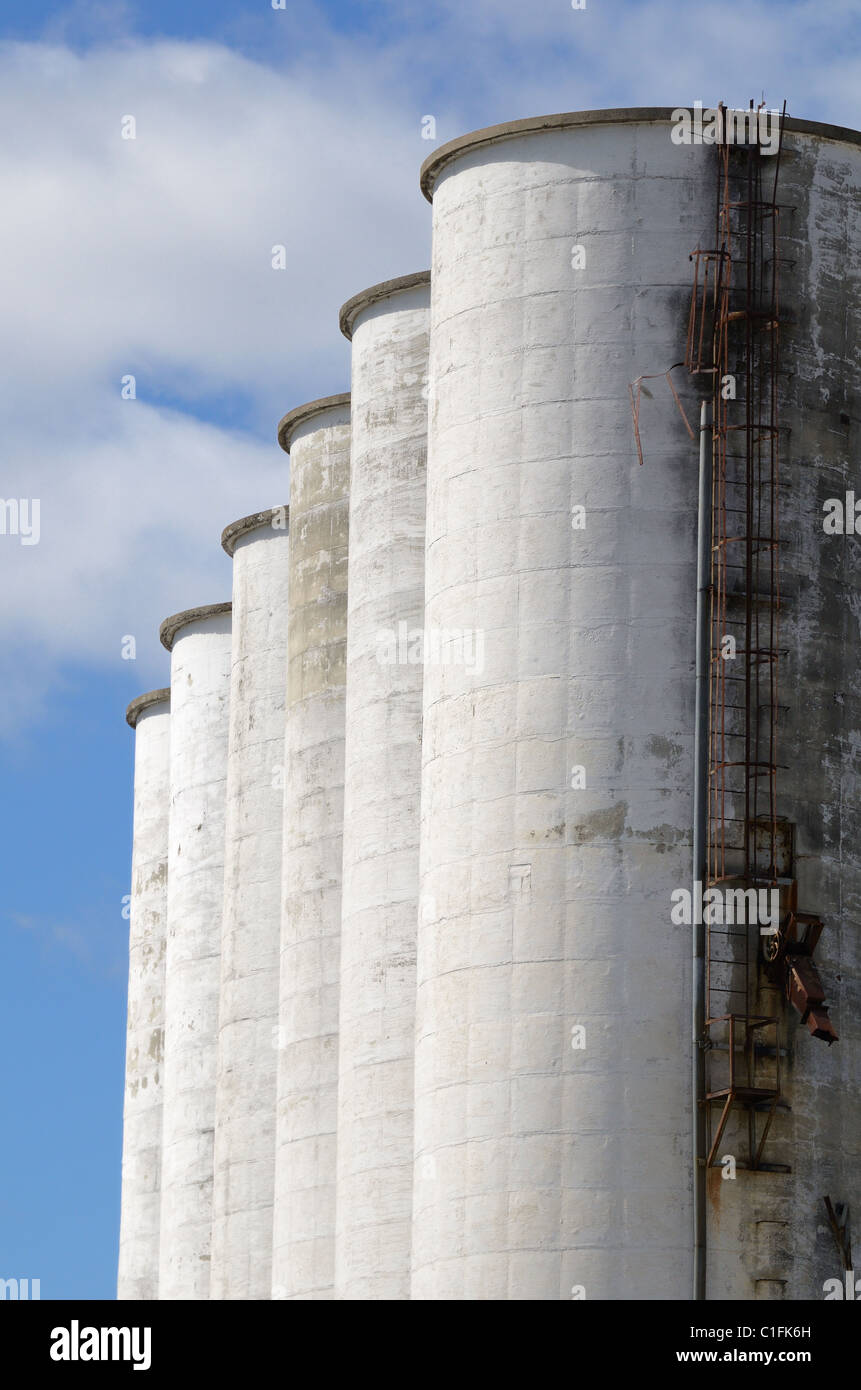 Large industrial silos in a row Stock Photo - Alamy