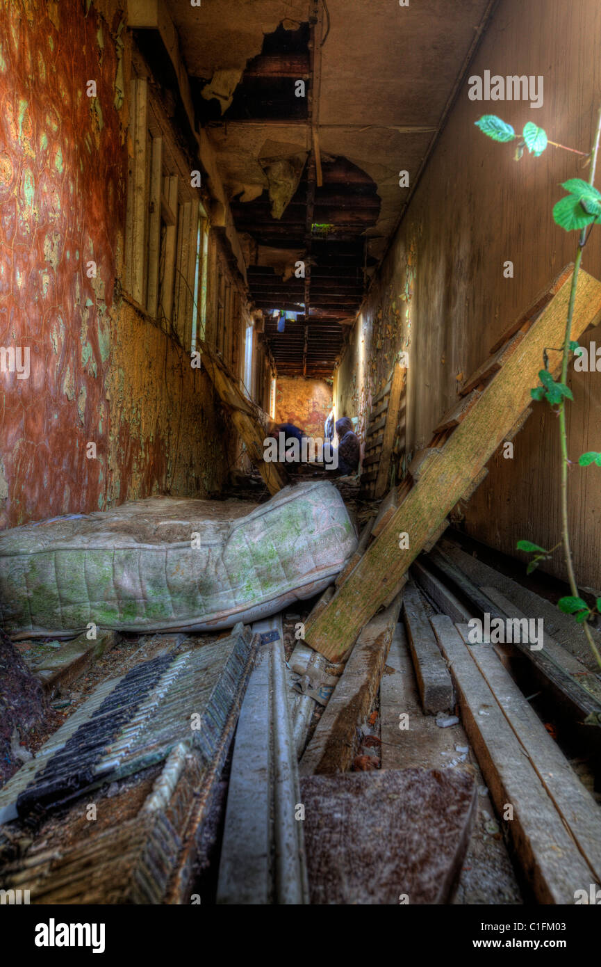 Derelict drug den, homeless slum, derelict surroundings, vandalised ...