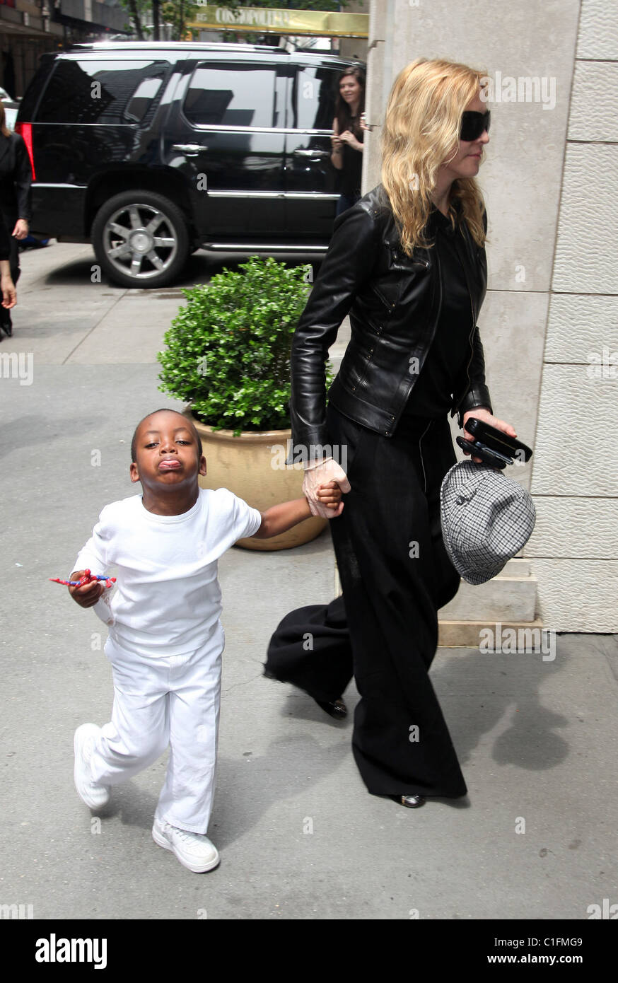 Madonna and son David Banda arriving at the Kabbalah Center New York ...