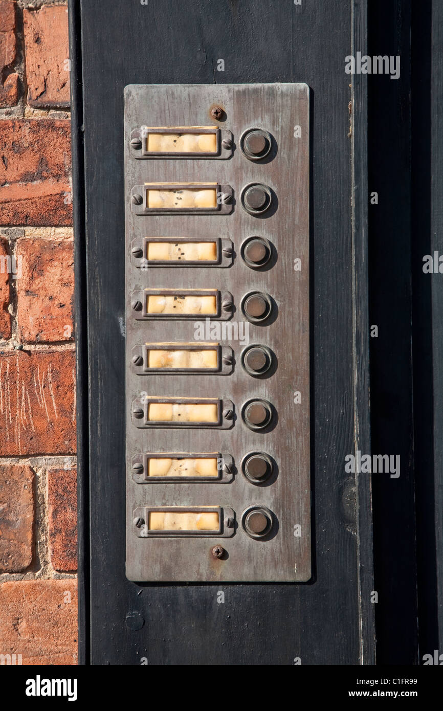 Old door bell panel, Stratford upon Avon Stock Photo - Alamy