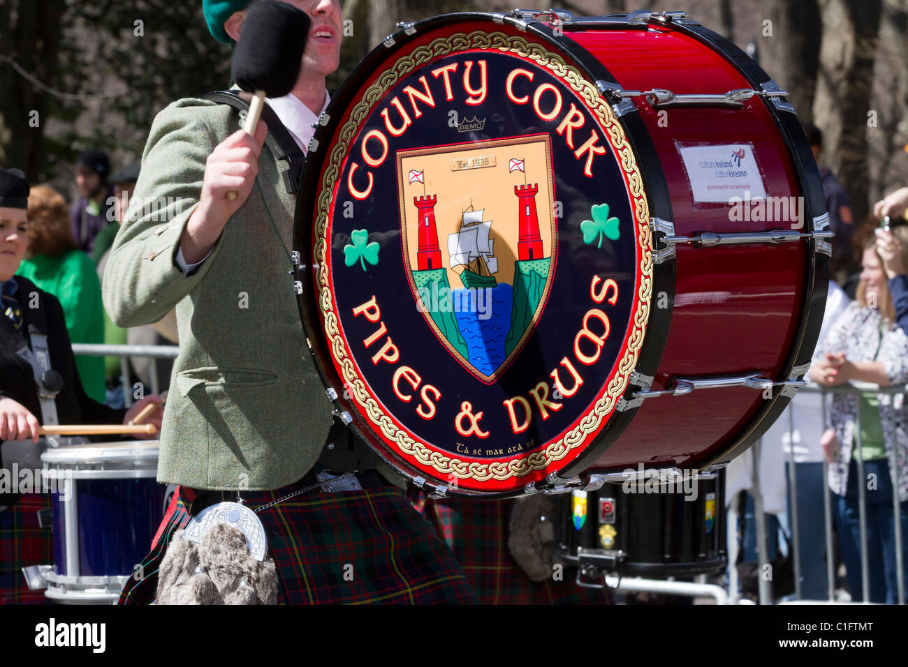 A drummer with the County Cork Pipe and Drum band marching in the 2011 ...
