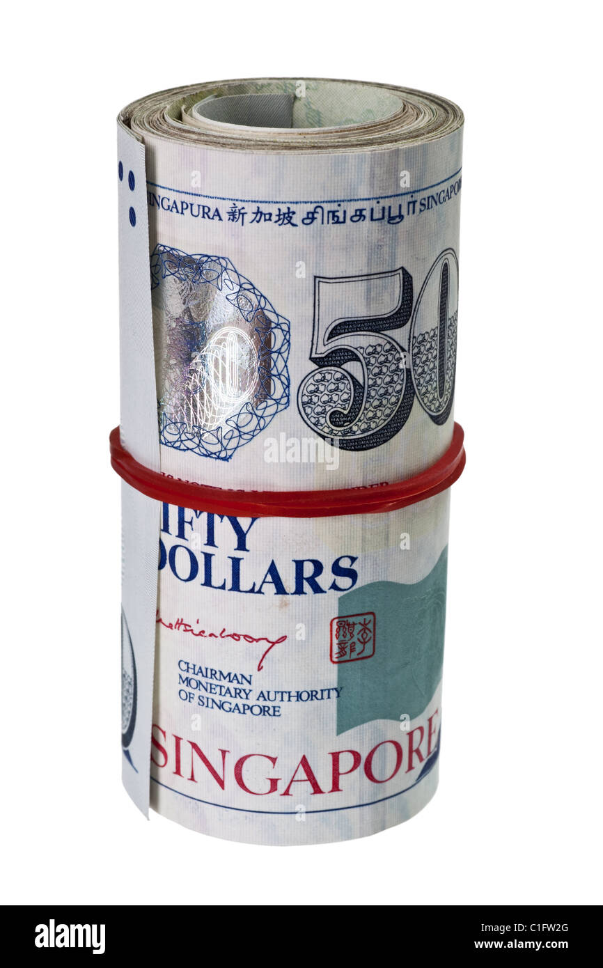Bundle of Singapore dollar isolated on white background Stock Photo - Alamy
