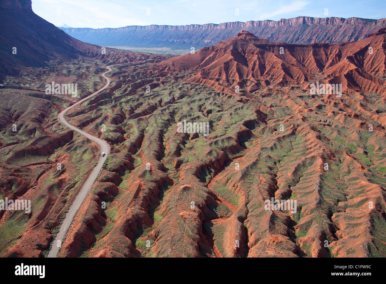 AERIAL VIEW. Winding road in a barren landscape. La Sal Mountain Loop ...