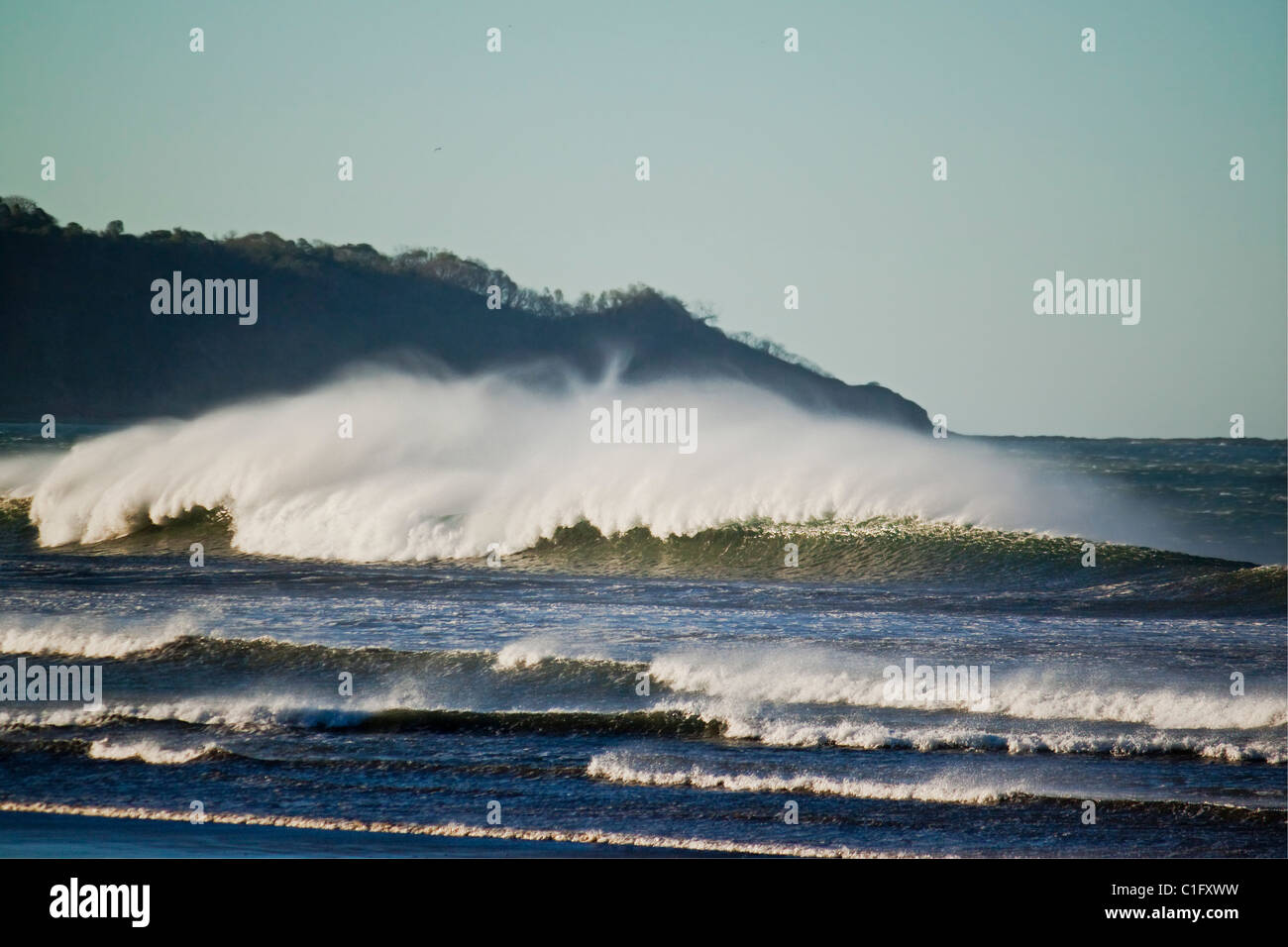 'Mare's tail' from a wave in a severe offshore wind off Playa Guiones ...