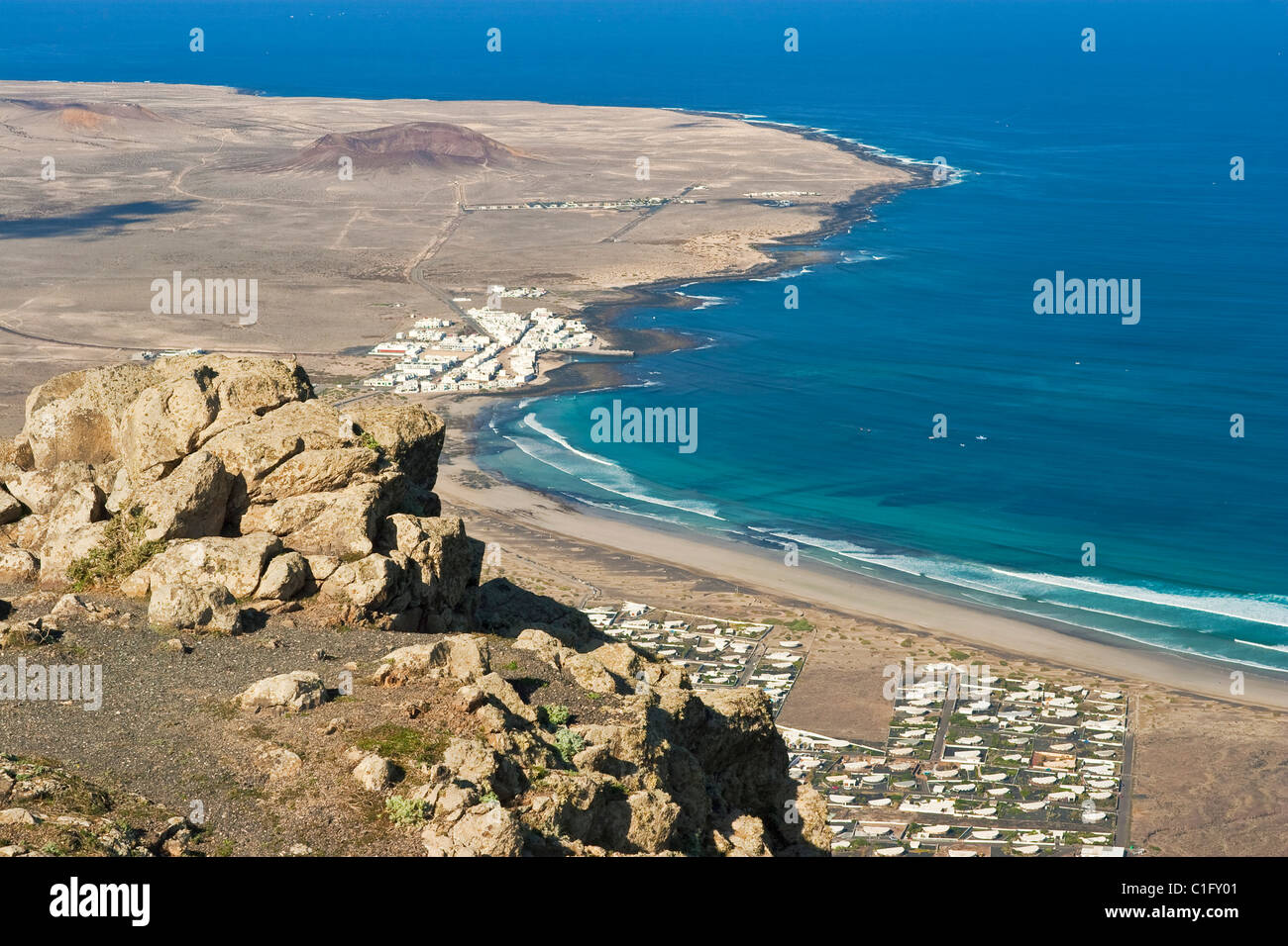View from the 600m Risco de Famara Range of the fine surf beach at ...