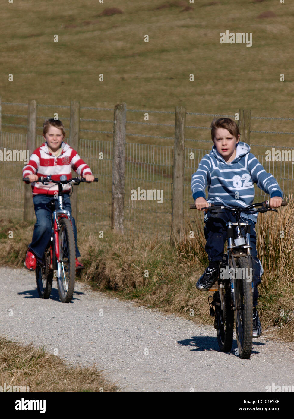 Two young boys riding bicycles, UK Stock Photo - Alamy Two young boys riding bicycles, UK Stock Photo - Alamy
