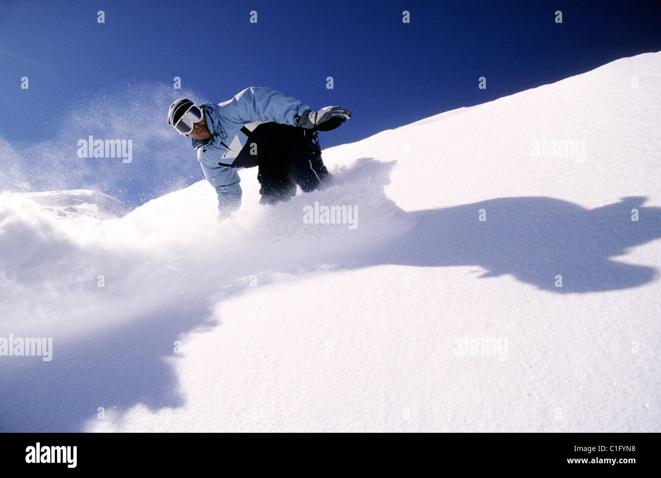 France, Isere, snowboard, going down the powder snow Stock Photo - Alamy