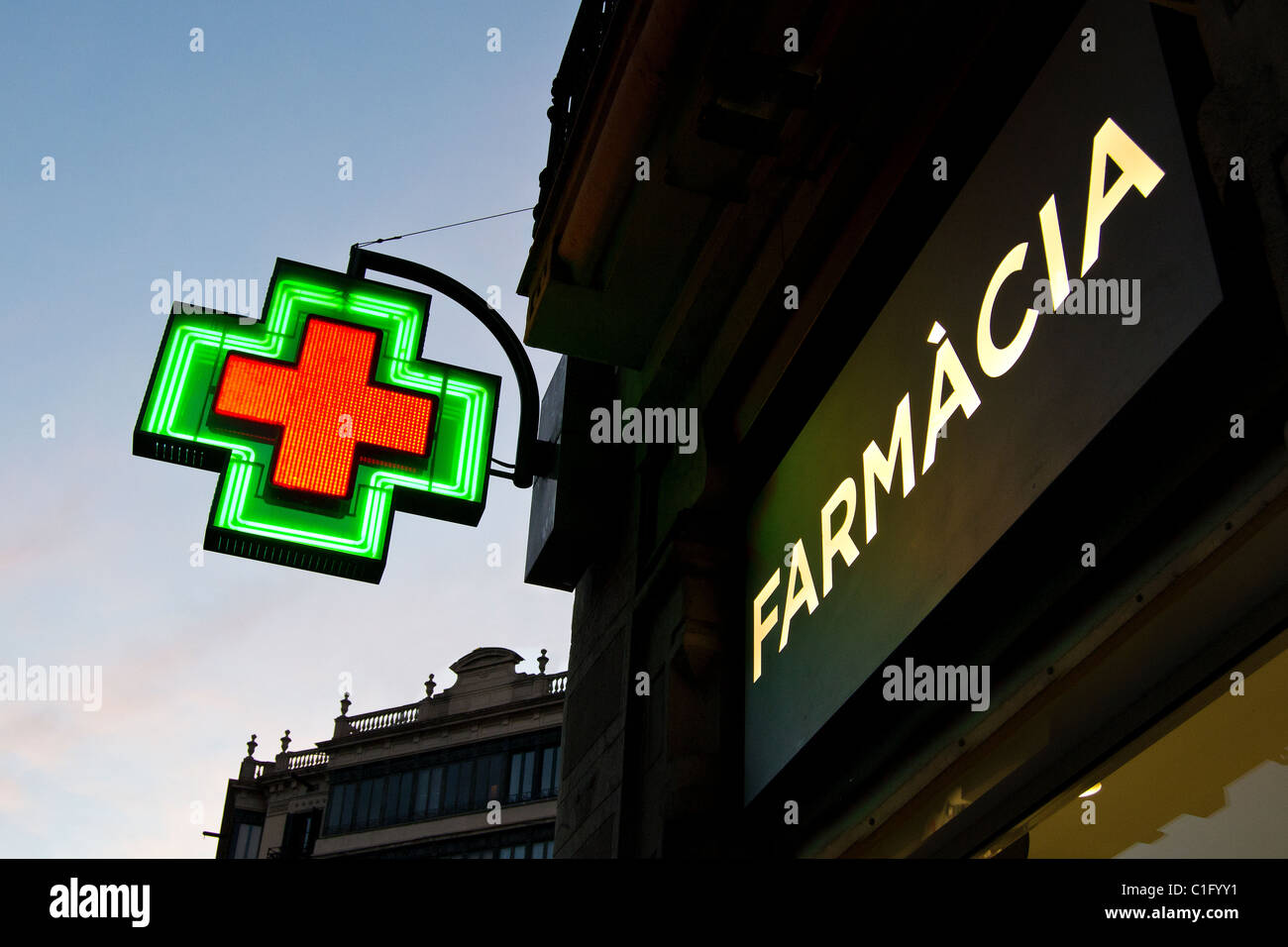 Pharmacy sign with red cross in LED's Stock Photo - Alamy