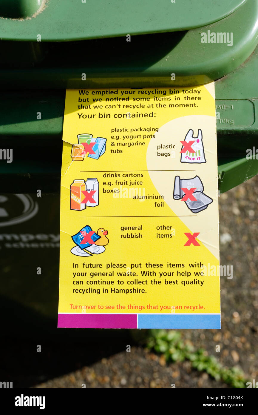 local council advisory leaflets left on residential recycling bin Stock ...