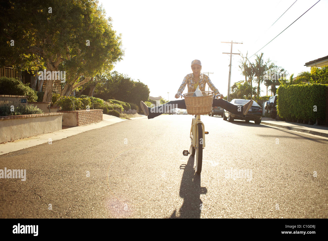 Bicycle woman happy legs hi-res stock photography and images - Alamy