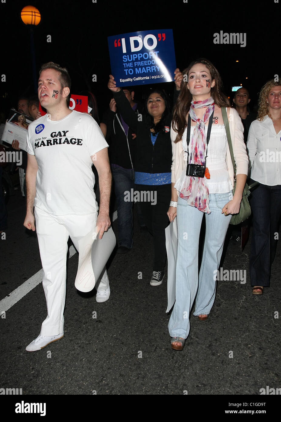 Emmy Rossum And Perez Hilton Celebrities Participate In A March Against