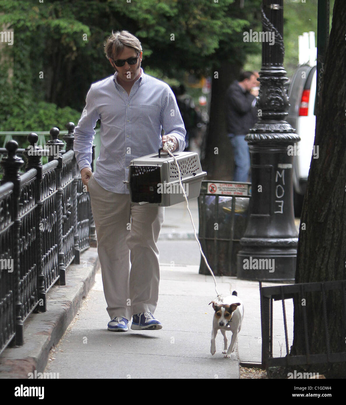 Matthew Broderick walking his dog as removal men get to work on his ...