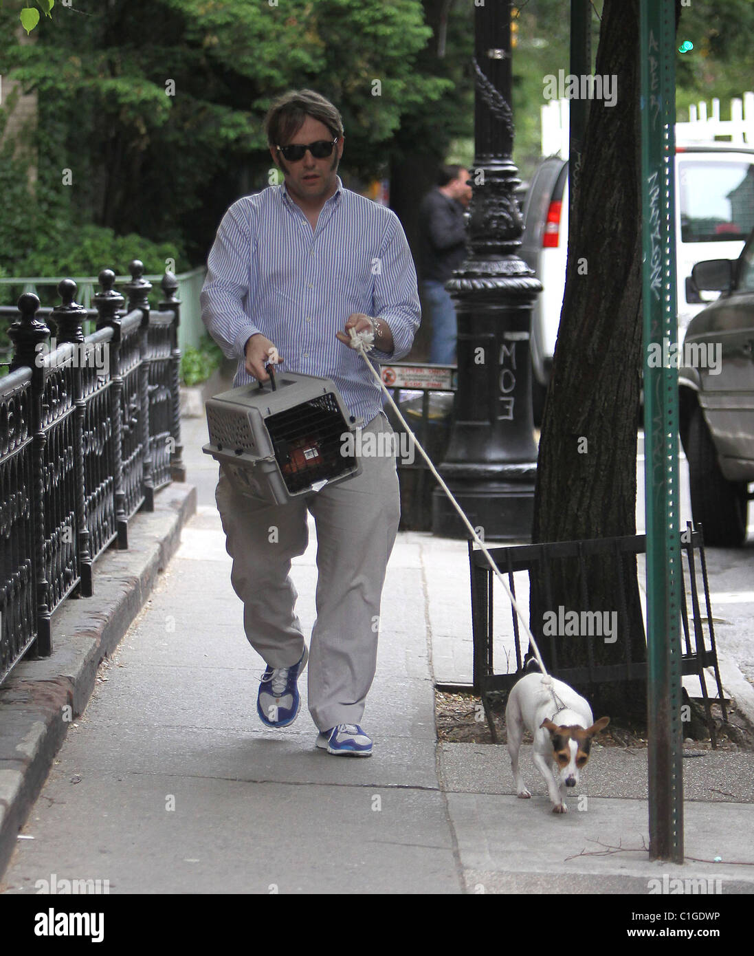 Matthew Broderick walking his dog as removal men get to work on his ...