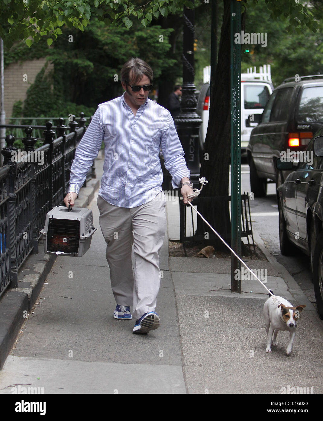 Matthew Broderick walking his dog as removal men get to work on his ...