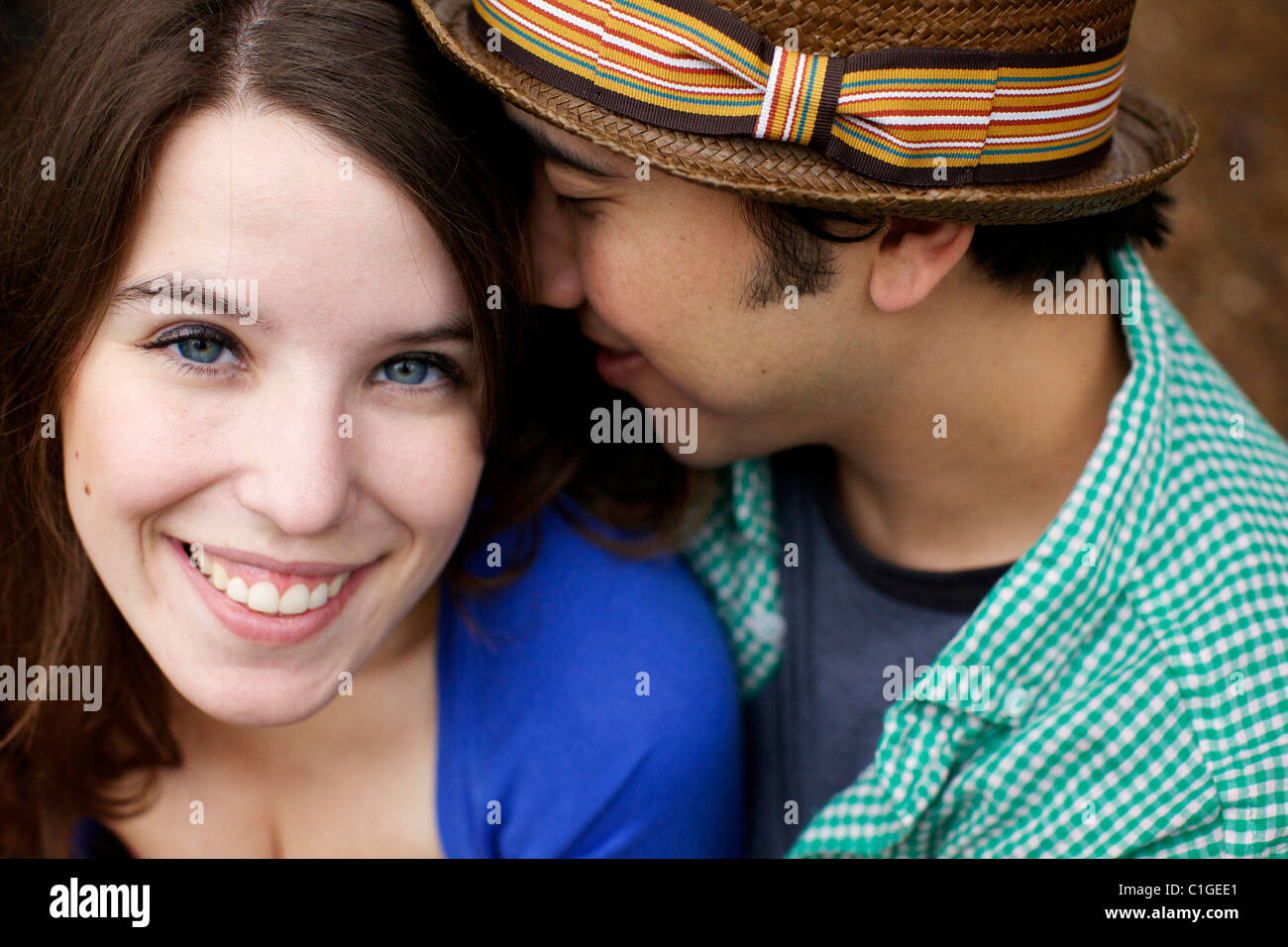 Smiling couple hugging Stock Photo - Alamy