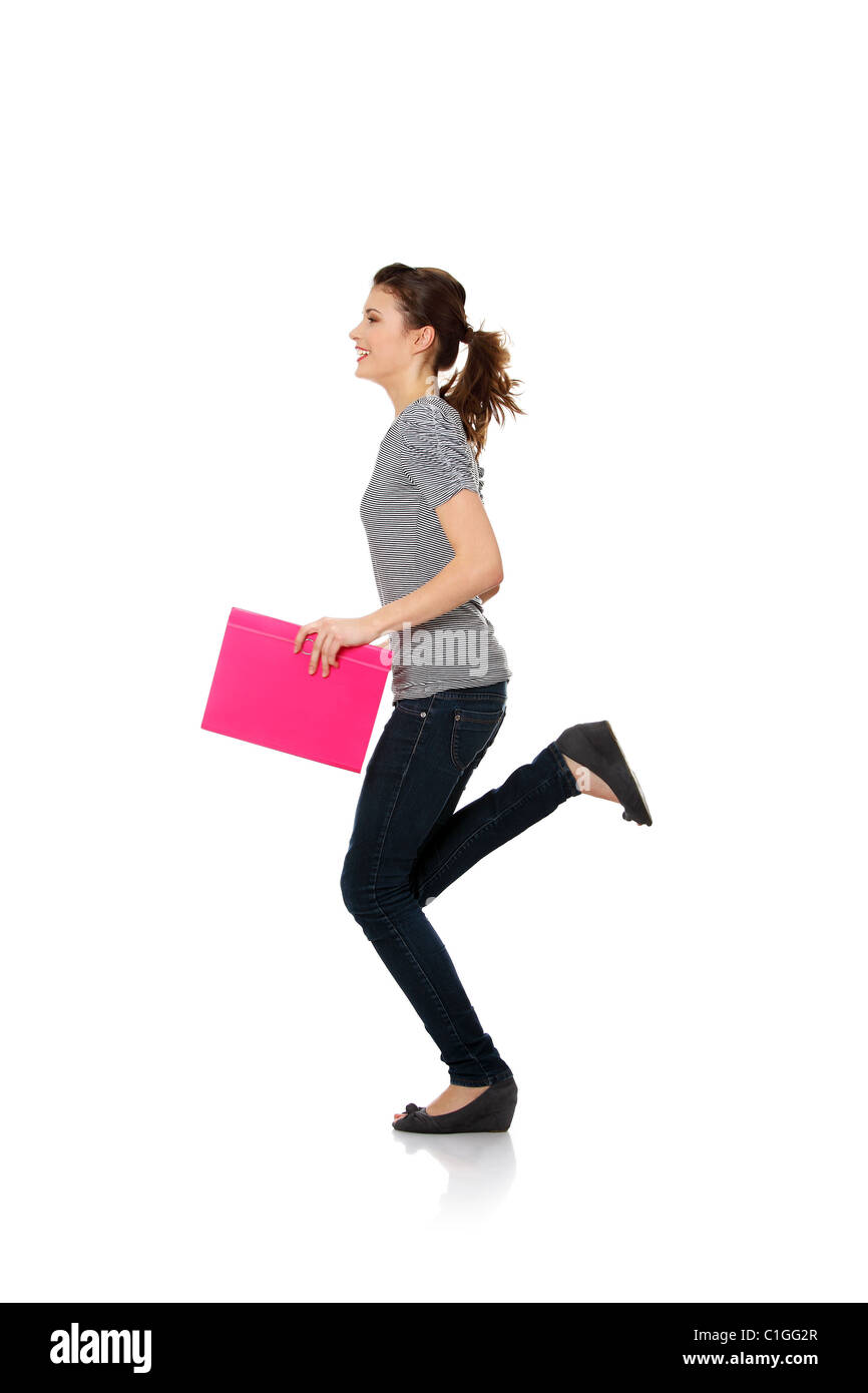 Happy teen student girl running, isolated on white background Stock ...