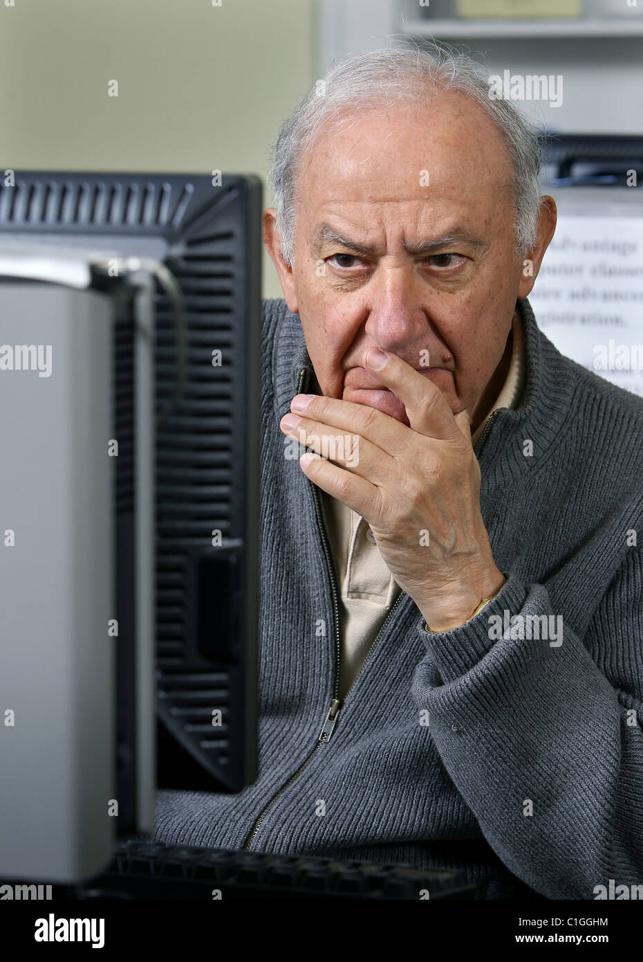 Senior citizen working on computer and learning the Internet Stock ...