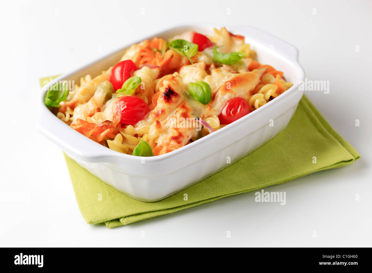 Corkscrew pasta with cherry tomatoes and smoked cheese Stock Photo - Alamy