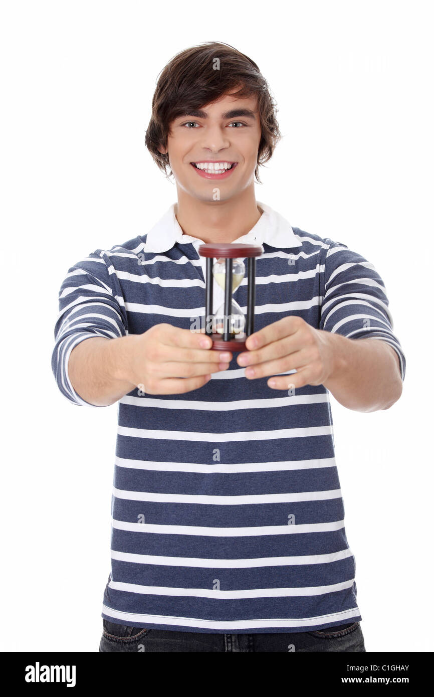 Young man with hourglass. Isolated on white background Stock Photo - Alamy