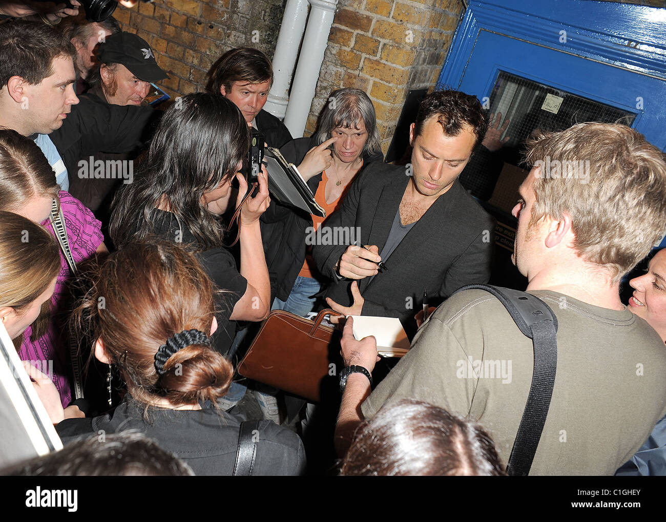 Jude Law leaving Wyndham's Theatre, having performed in a new ...