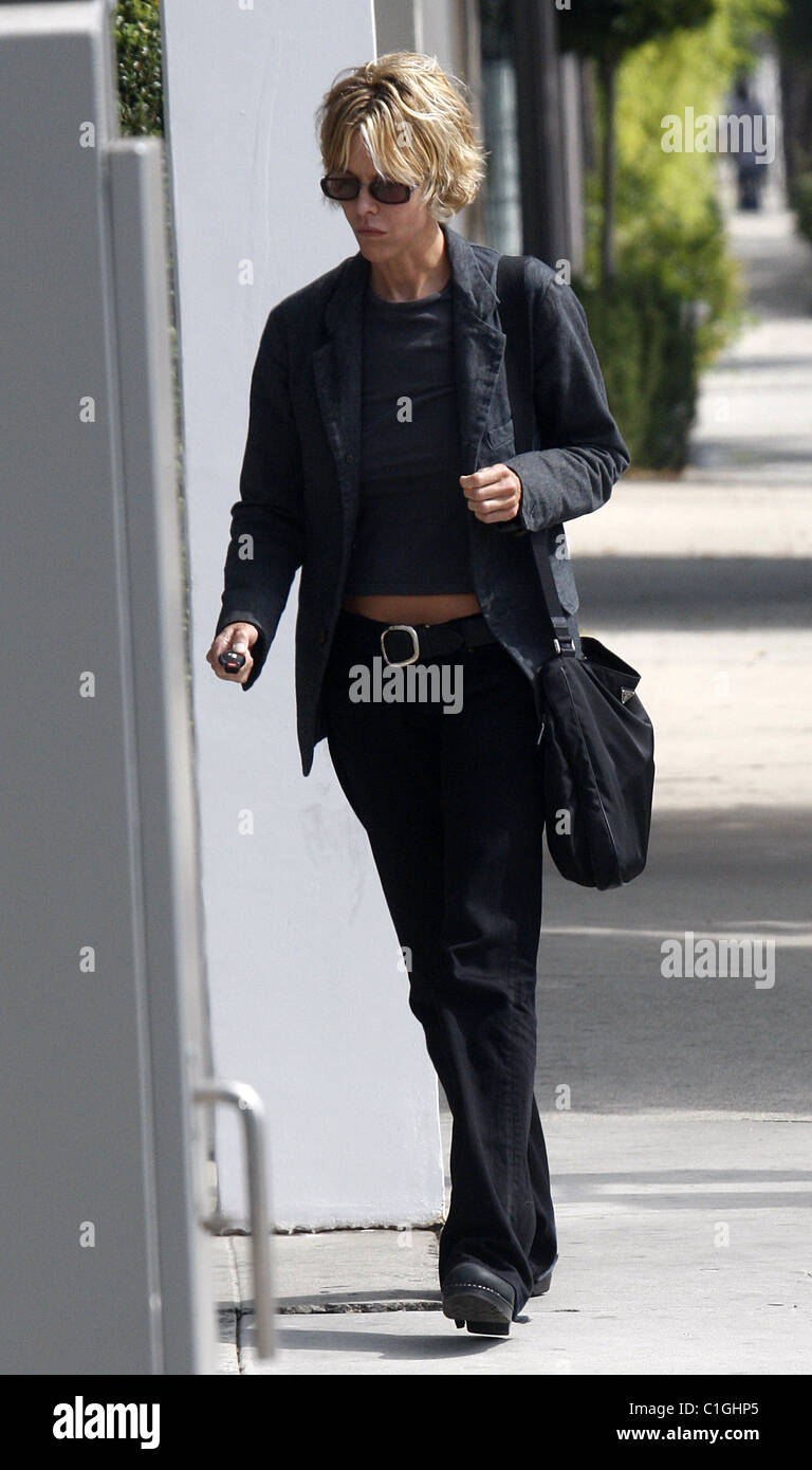 Meg Ryan dressed in black and walking in heavy boots heading for a hair ...