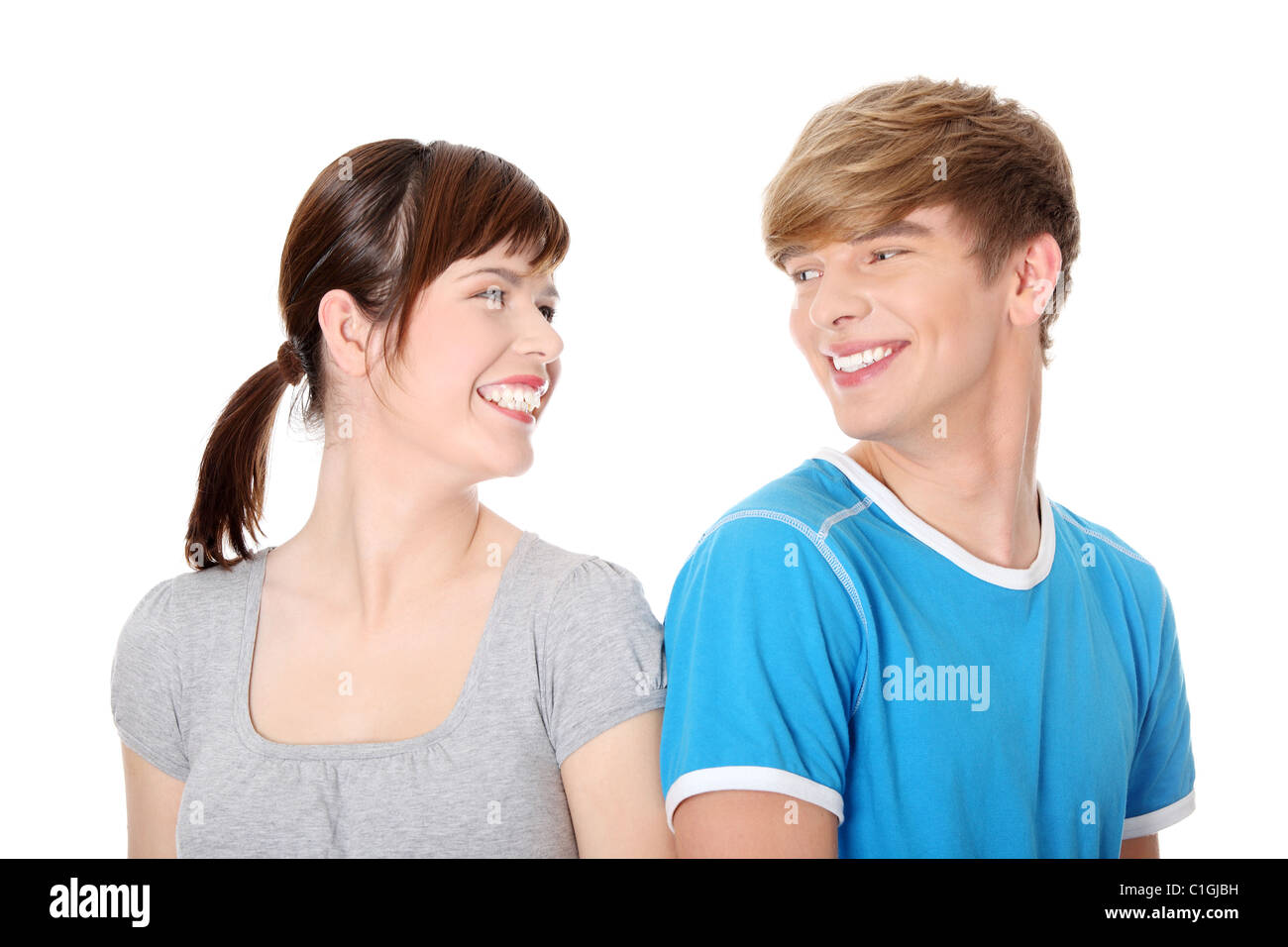 Two friend looking each other. Isolated on white background Stock Photo ...