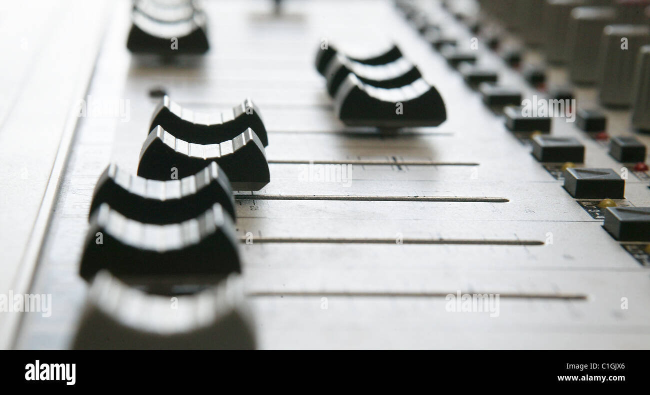 Sound producer mixer. Faders of channels and regulators Stock Photo - Alamy